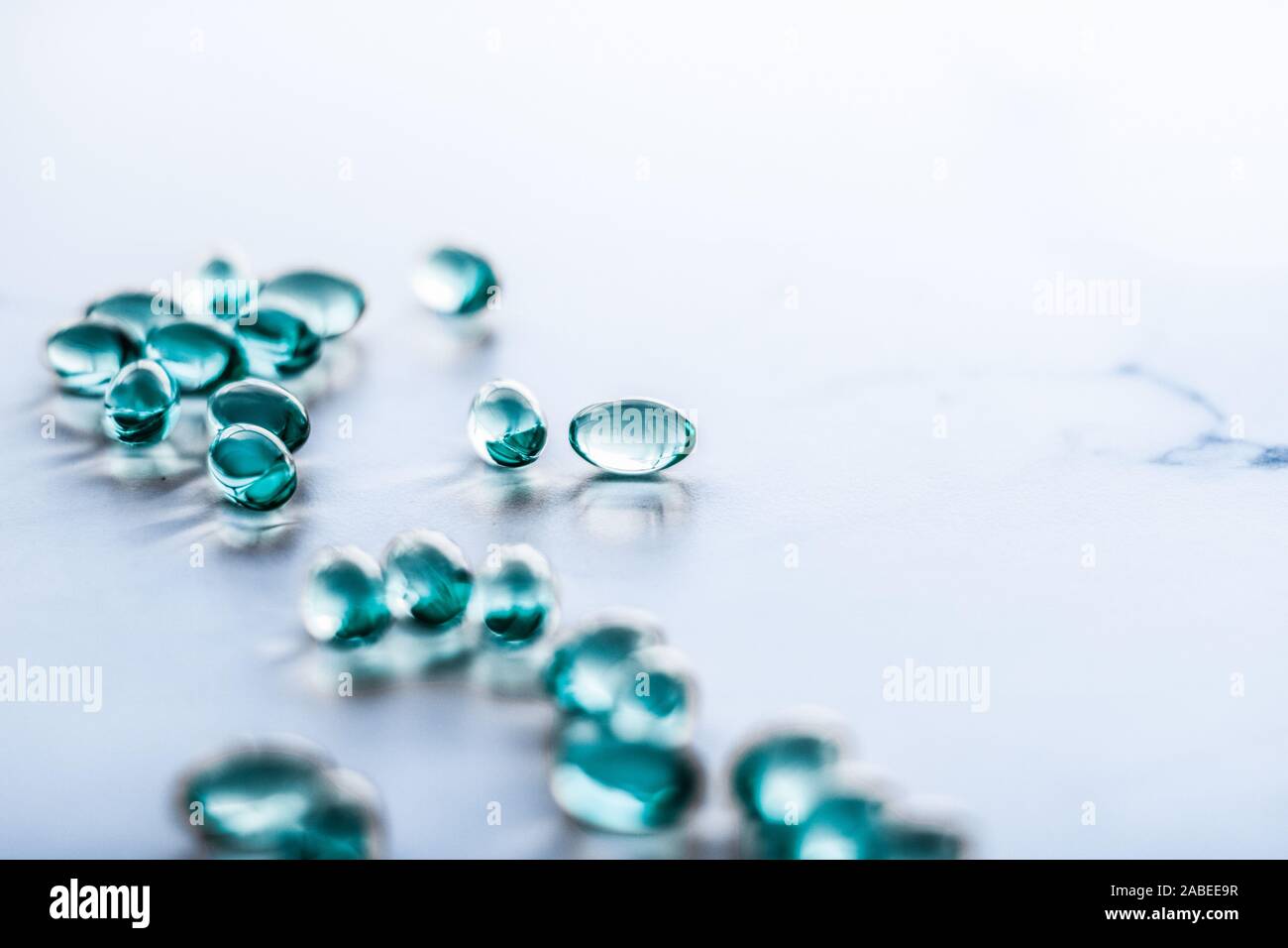 Pharmaceutical, branding and science concept - Blue pills for healthy ...