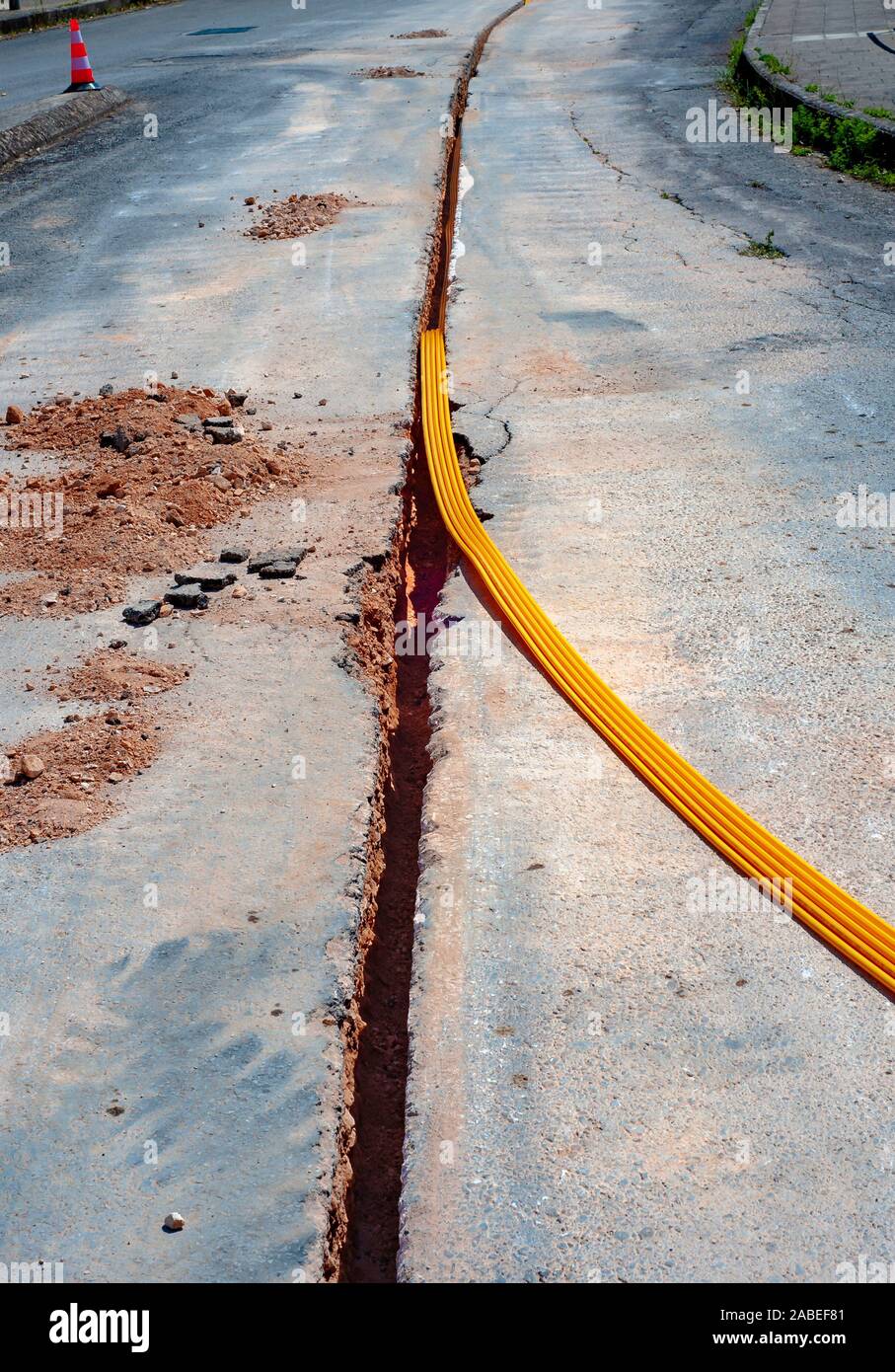 digging a restricted section for buried corrugated plastic conduits to ...