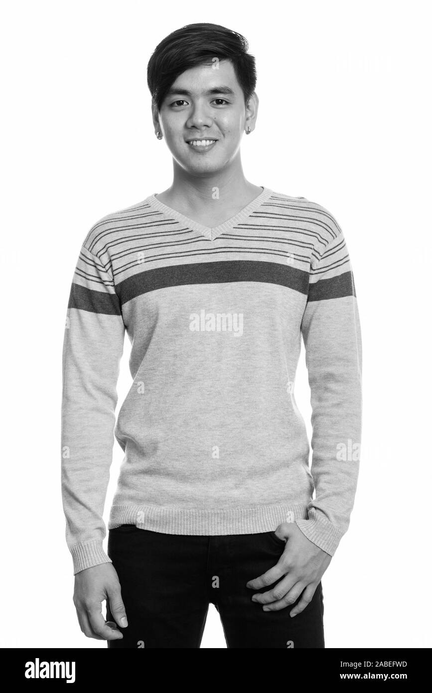 Young happy Asian man smiling in black and white Stock Photo - Alamy