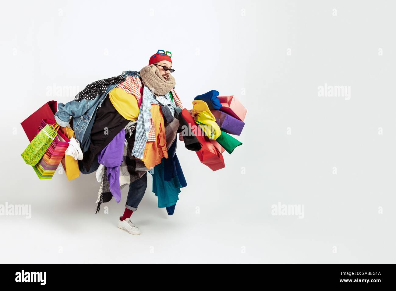 Shopping like an issue. Man addicted of sales. Overproduction and crazy ...