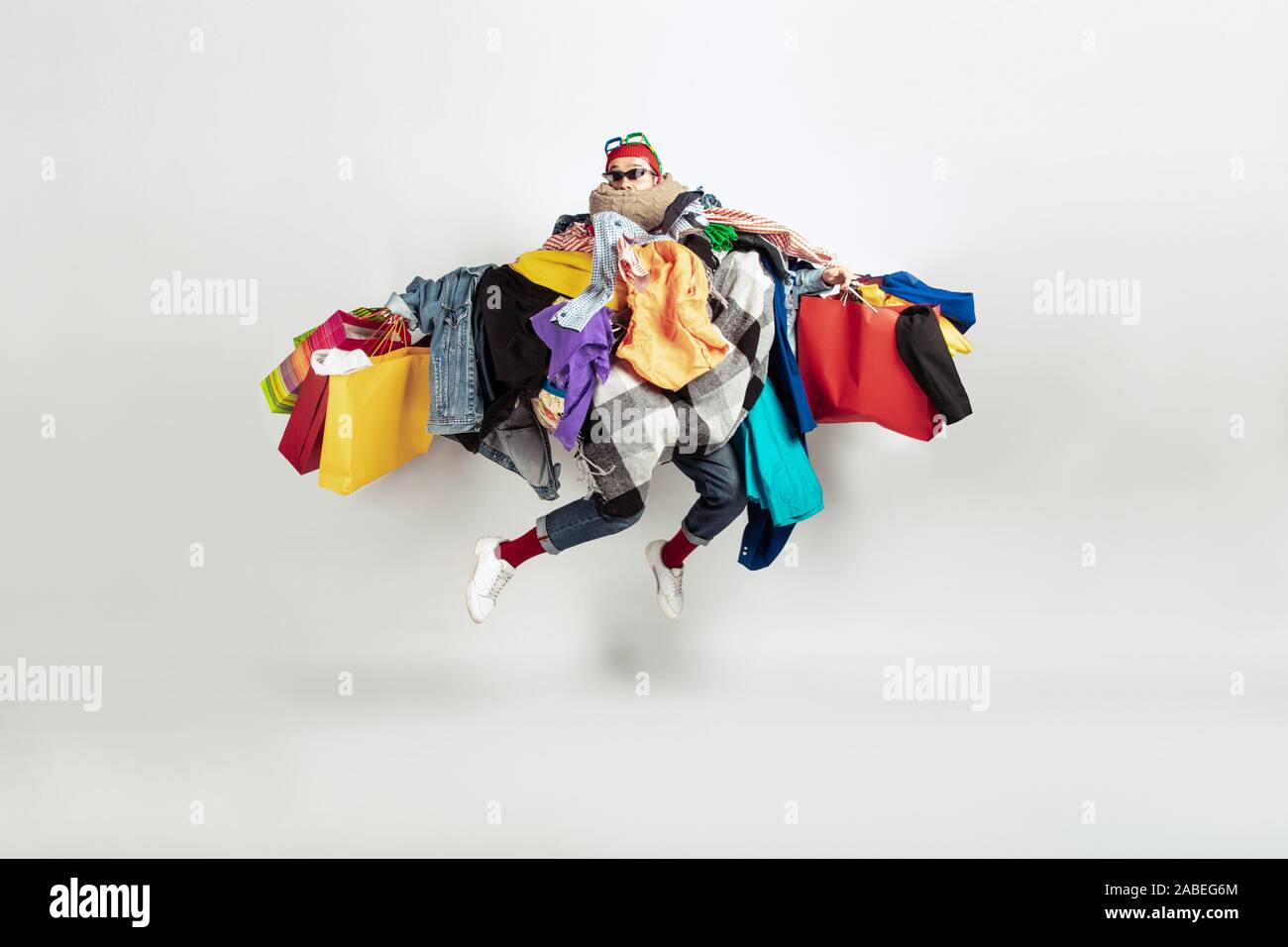 Shopping like an issue. Man addicted of sales. Overproduction and crazy ...