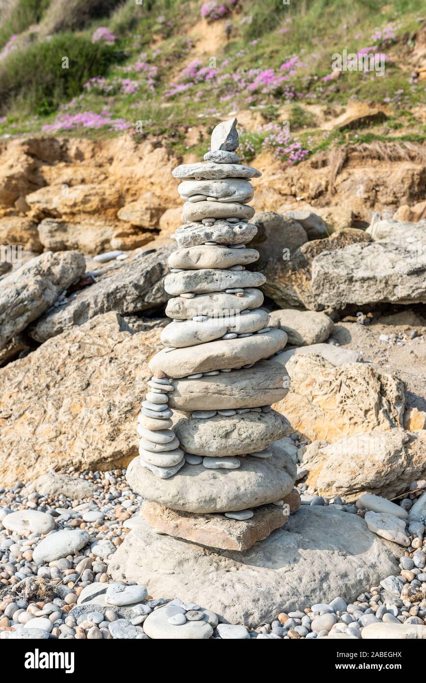 Pyramid of stones on the sea Stock Photo - Alamy