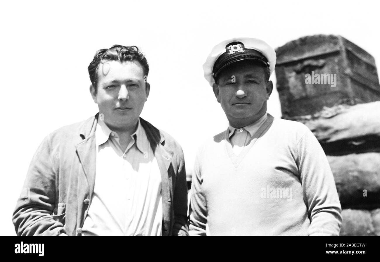 RAIN, from left: director Lewis Milestone, producer Joseph M. Schenck ...