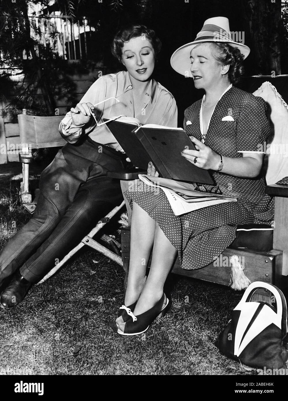 REMEMBER?, from left: Greer Garson examines the script with her mother ...