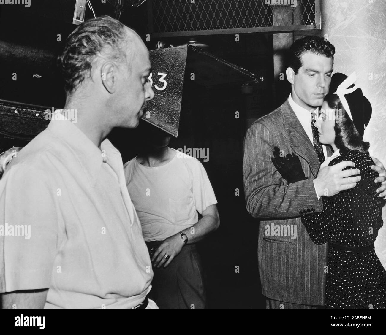 REMEMBER THE NIGHT, from left; director Mitchell Leisen, Fred MacMurray ...