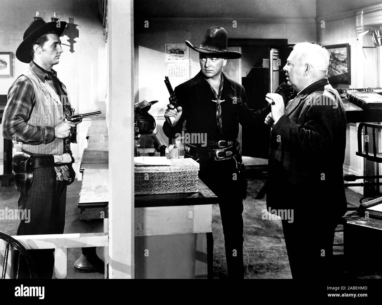 RIDERS OF THE DEADLINE, from left, Robert Mitchum, William Boyd ...