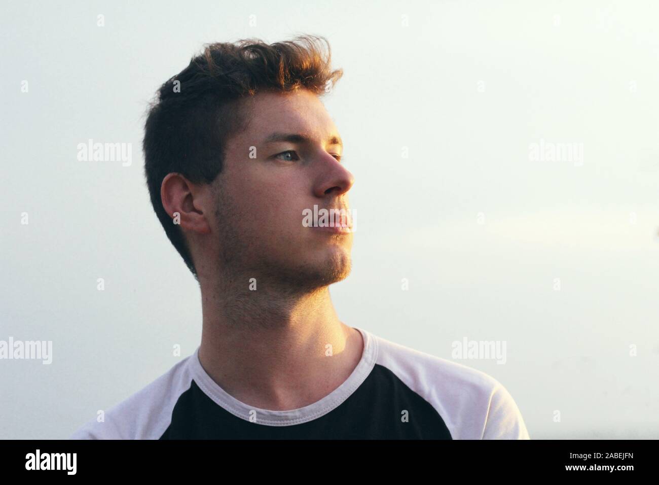 Man in sunlight hi-res stock photography and images - Alamy
