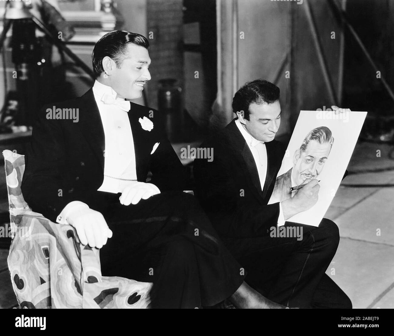 SAN FRANCISCO, from left: Clark Gable having his picture drawn by Harry ...