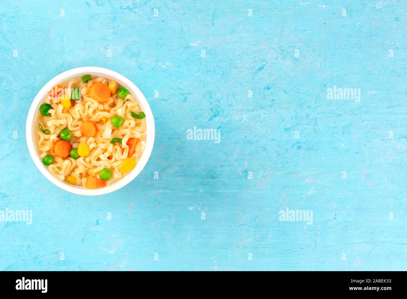 Ramen cup, instant noodles in a plastic cup, shot from the top on a ...