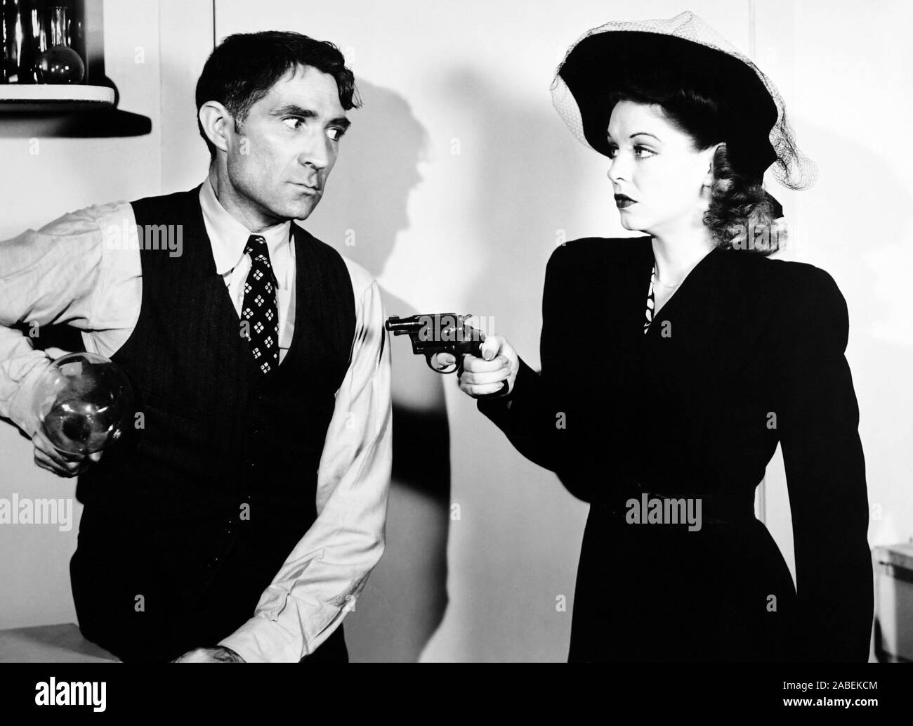 THE SECRET CODE, from left, Trevor Bardette, Anne Nagel, 1942 Stock ...