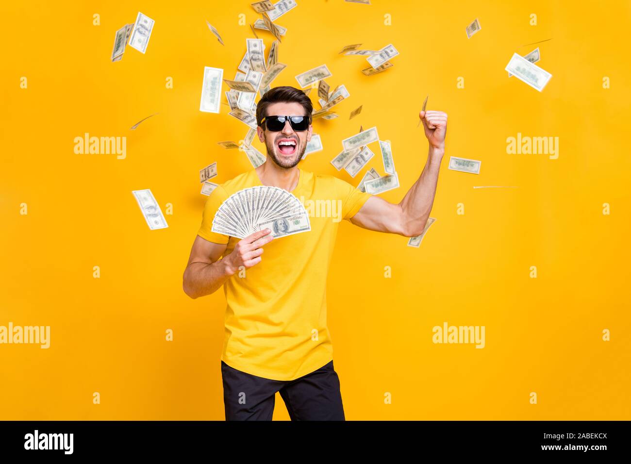 Portrait of his he nice attractive content cheerful cheery guy throwing ...