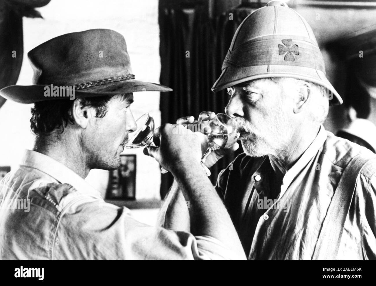 SHOUT AT THE DEVIL, from left, Roger Moore, Lee Marvin, 1976 Stock ...