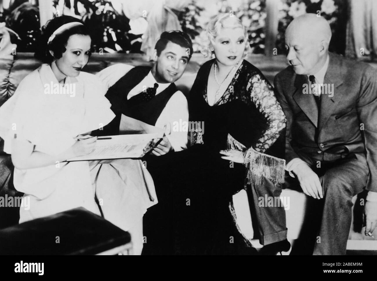 SHE DONE HIM WRONG, from left: the script girl with Cary Grant, Mae ...