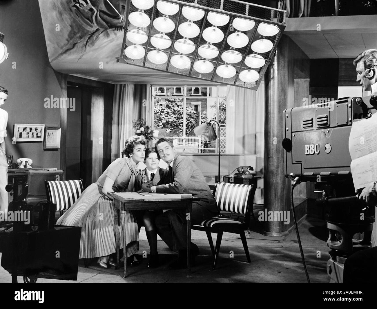 SIMON AND LAURA, from left, Kay Kendall, Clive Parritt, Peter Finch ...