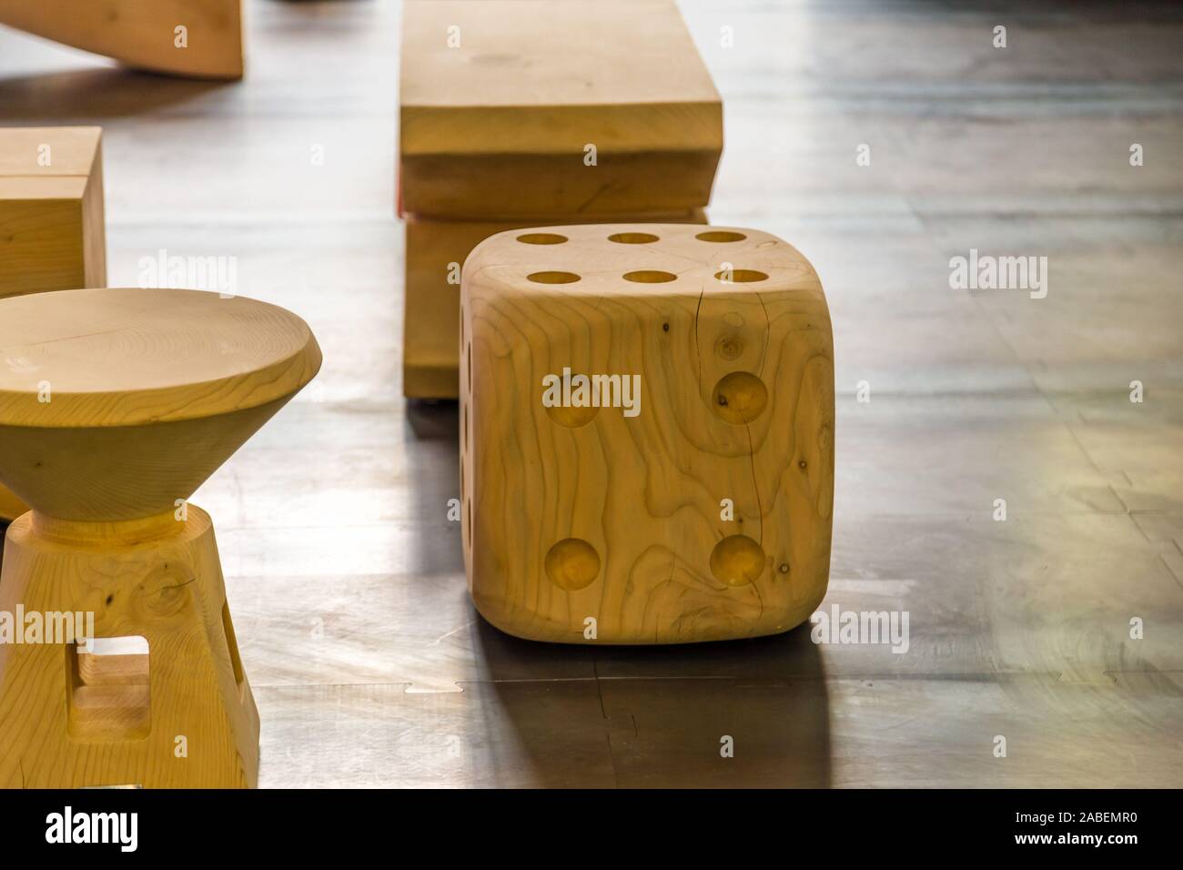 giant wooden dice as chair Stock Photo - Alamy
