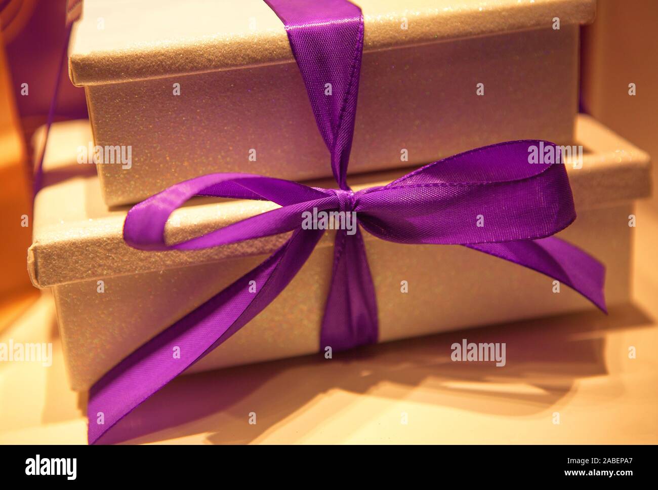 box with bow on festive background Stock Photo - Alamy