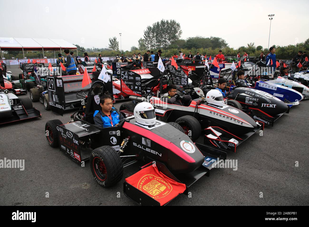 Participated students and their self-produced formulas prepare for the ...