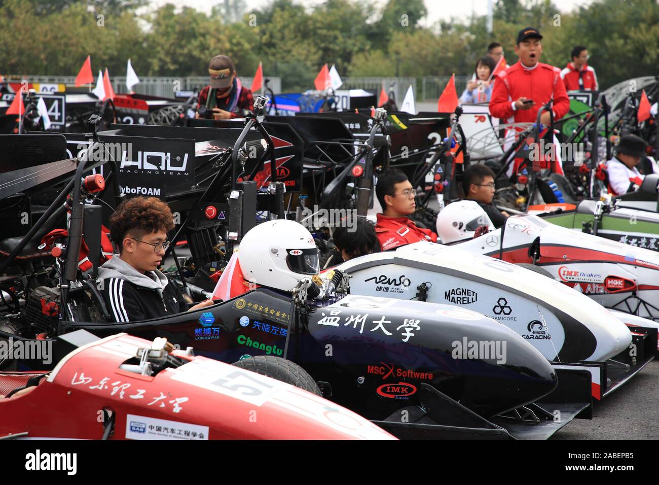 Participated students and their self-produced formulas prepare for the ...