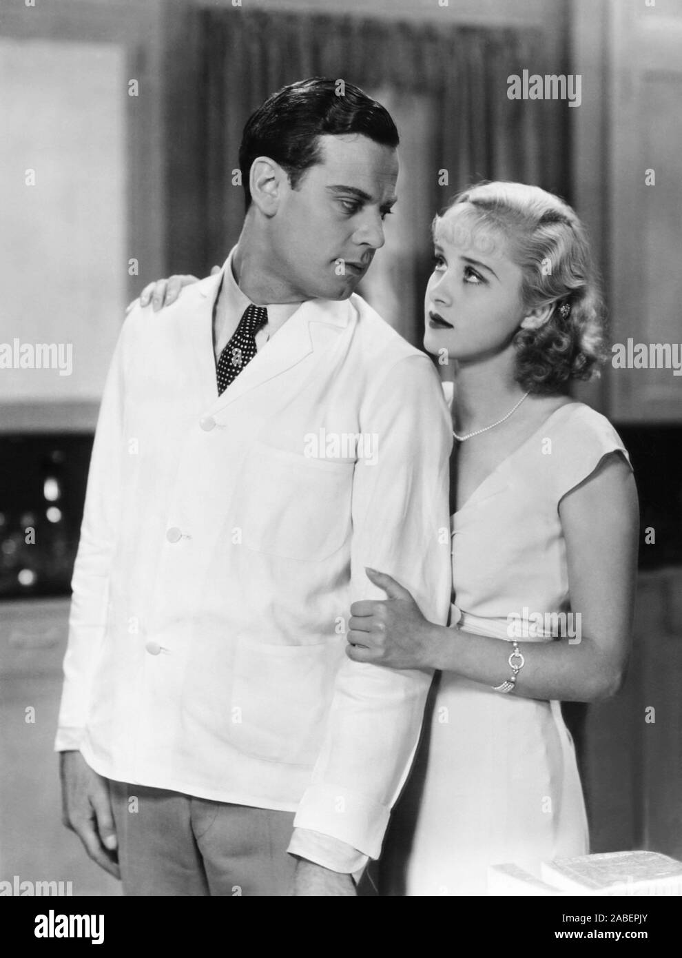 STRANGE JUSTICE, from left: Norman Foster, Marian Marsh, 1932 Stock ...