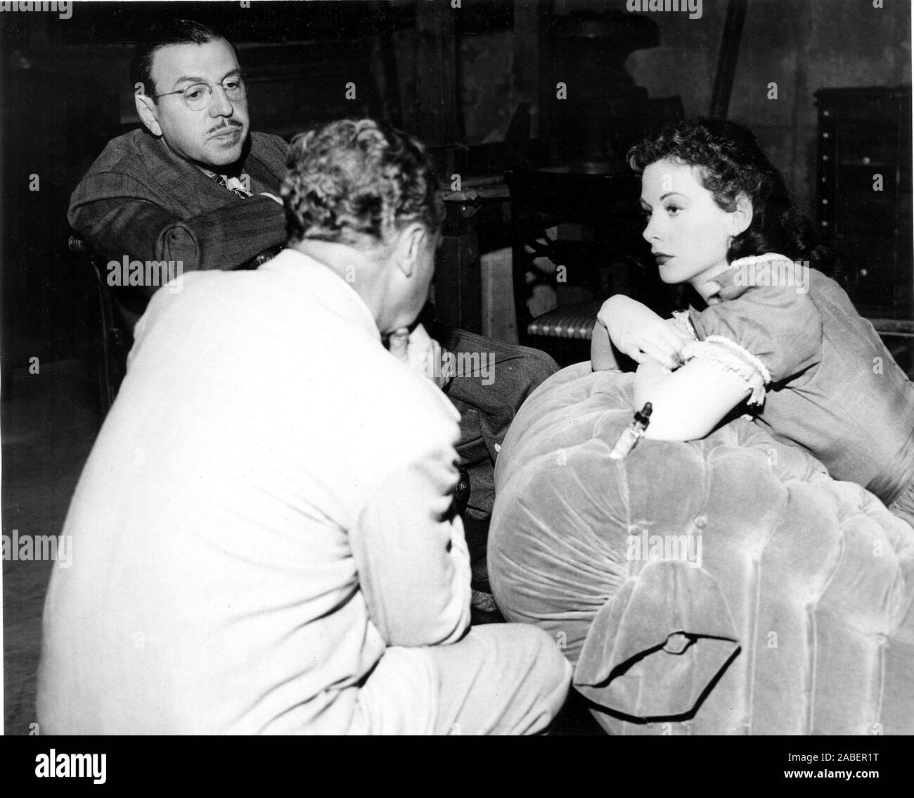 THE STRANGE WOMAN, from left, facing camera, producer Jack Chertok ...