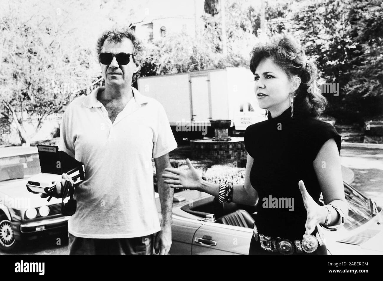 SURRENDER, from left: director Jerry Belson, Sally Field on set, 1987 ...