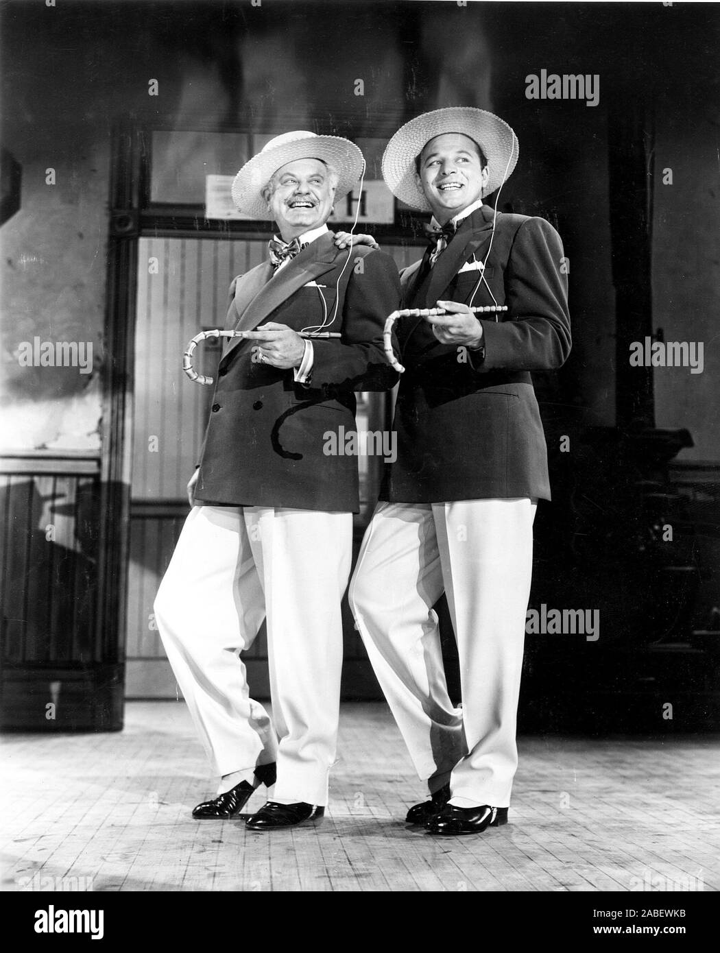 THANK YOUR LUCKY STARS, from left, Alan Hale, Sr., Jack Carson, 1943 ...