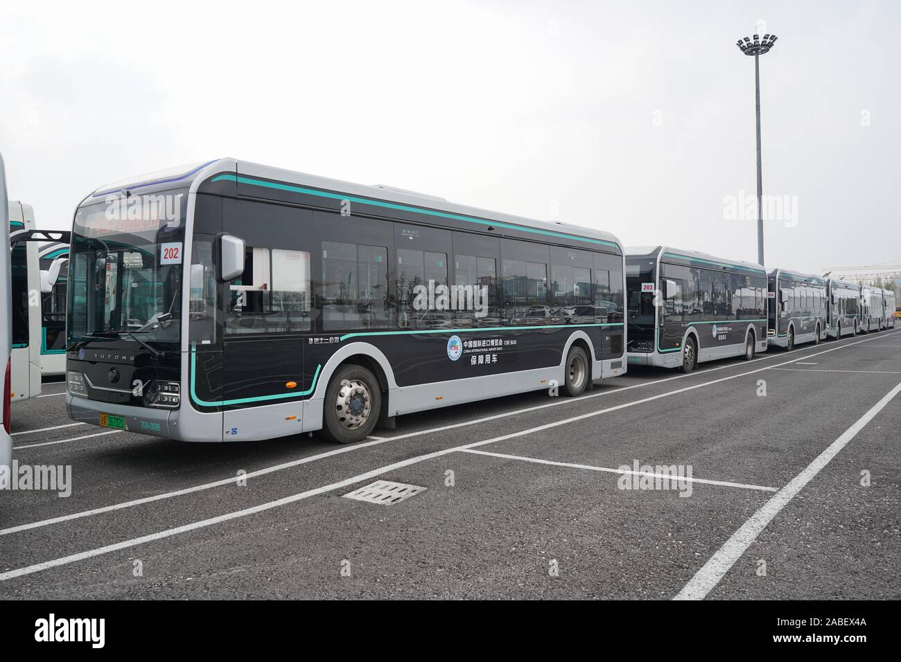 A view of shuttle buses lining outside the National Exhibition and ...