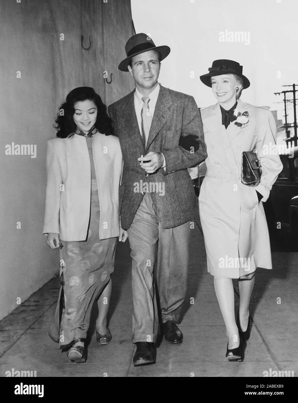 TO THE ENDS OF THE EARTH, from left: Maylia, Dick Powell, Signe Hasso ...