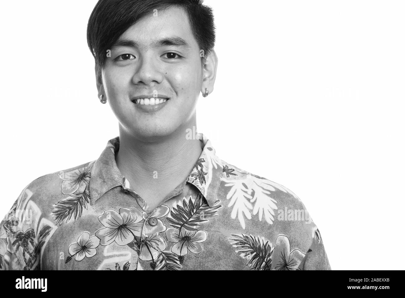 Young asian man in white hi-res stock photography and images - Alamy