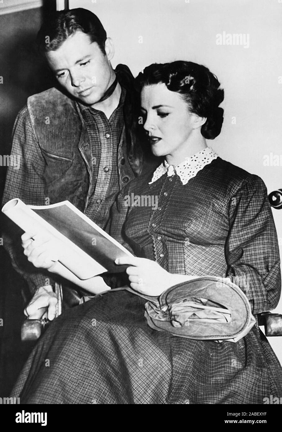 TUMBLEWEED, from left: Audie Murphy, Madge Meredith on set, 1953 Stock ...