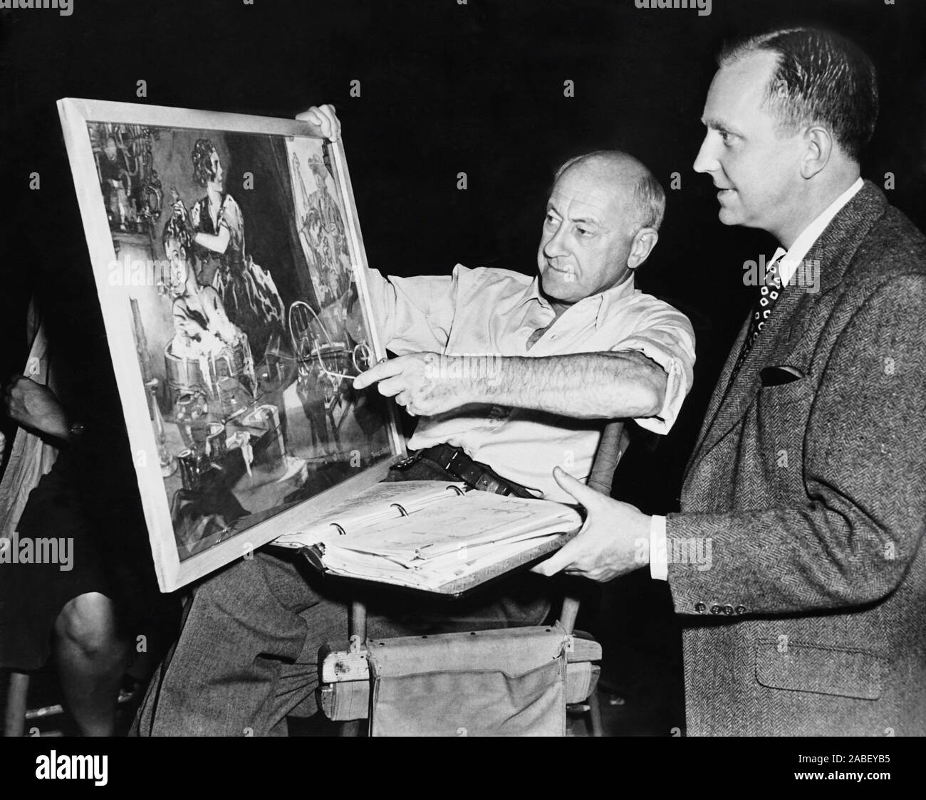 UNCONQUERED, from left: director Cecil B. DeMille examining a scene ...