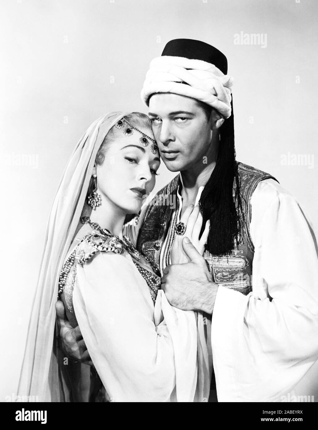 VALENTINO, from left, Eleanor Parker, Anthony Dexter, 1951 Stock Photo ...