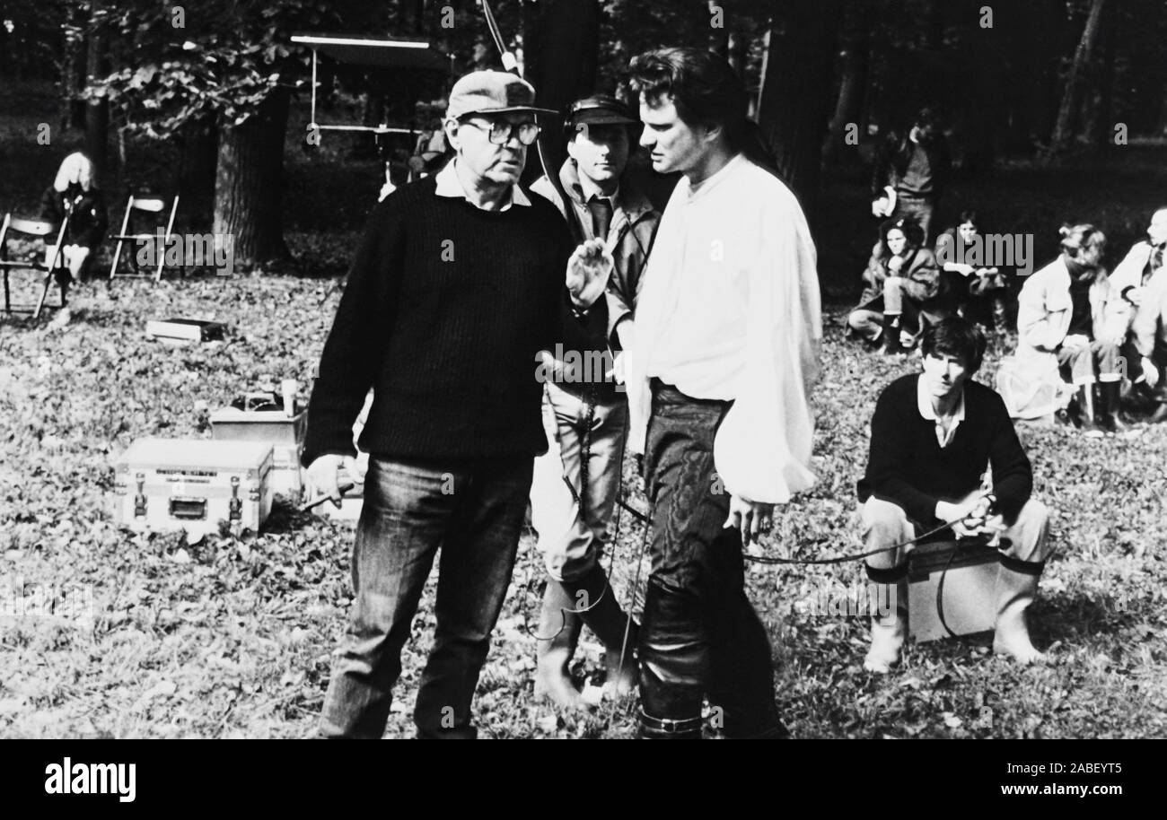 VALMONT, from left: director Milos Forman, Colin Firth on set, 1989 ...