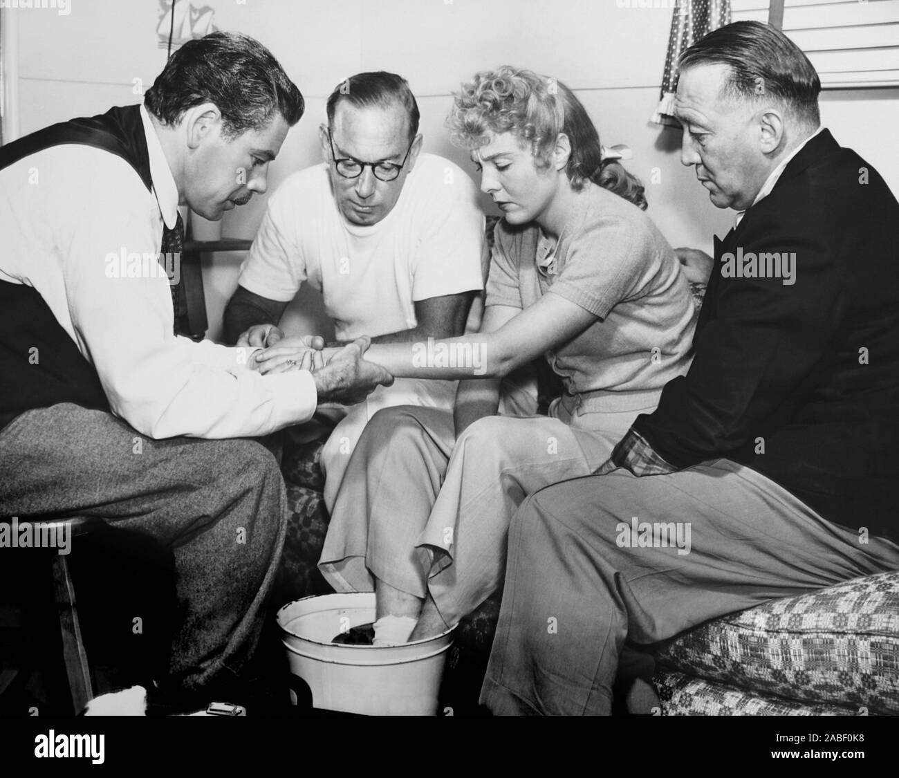 WE ARE NOT ALONE, from left: Paul Muni,Warner Brothers studio physician ...