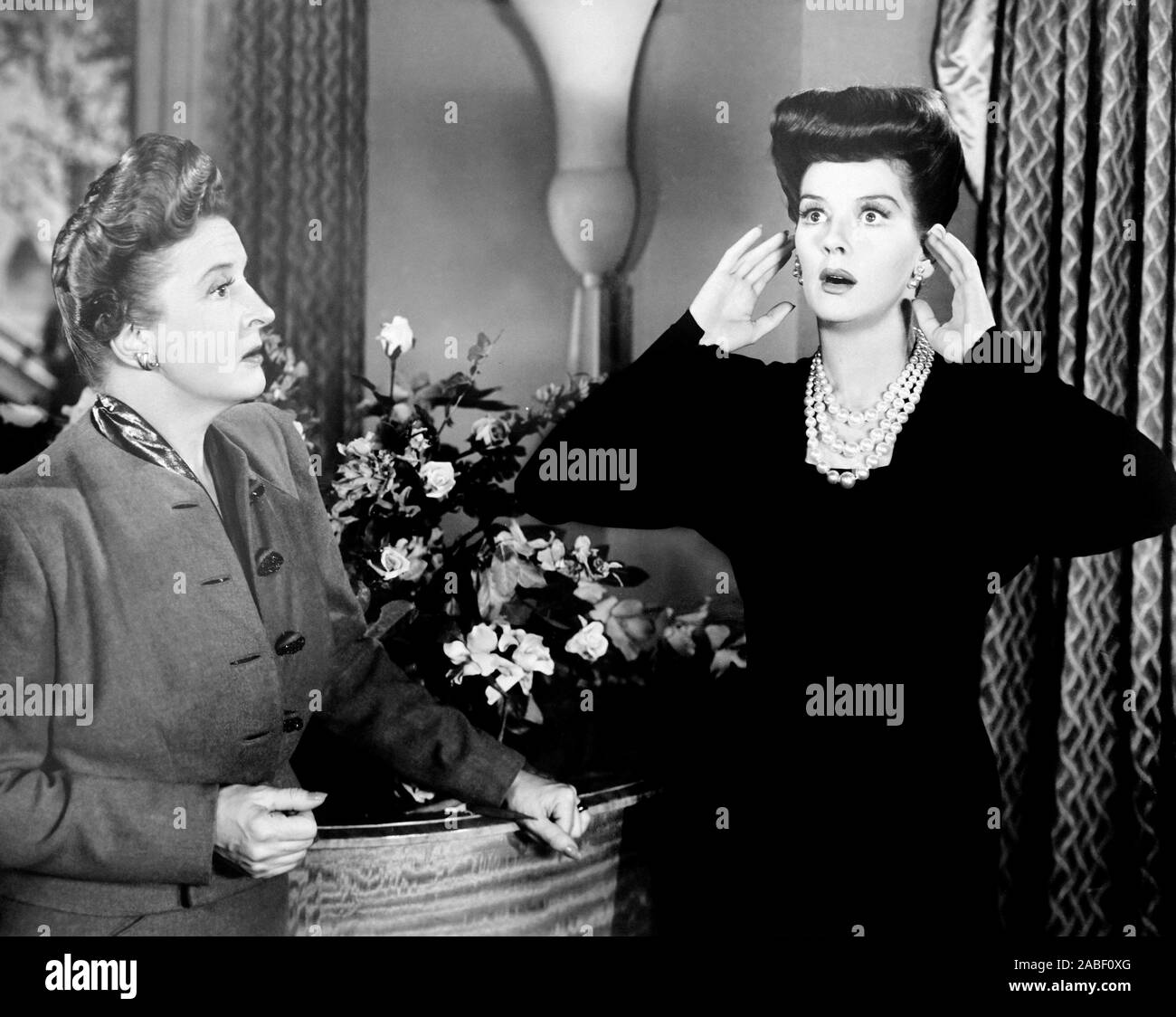 WHAT A WOMAN!, from left, Doris Lloyd, Rosalind Russell, 1943 Stock ...