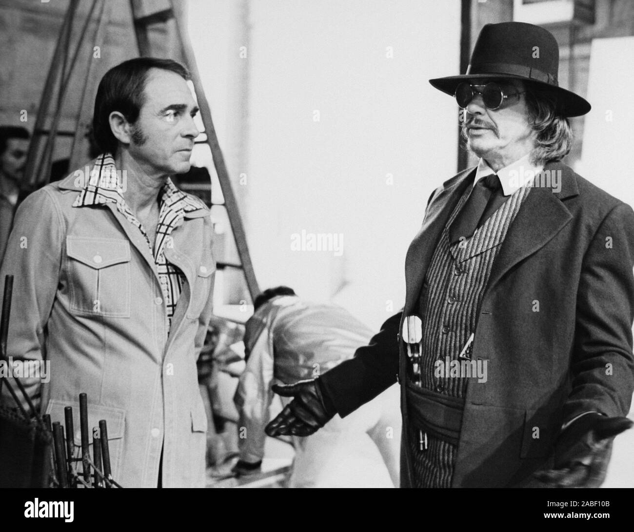 THE WHITE BUFFALO, from left: Army Archard, Charles Bronson on set ...