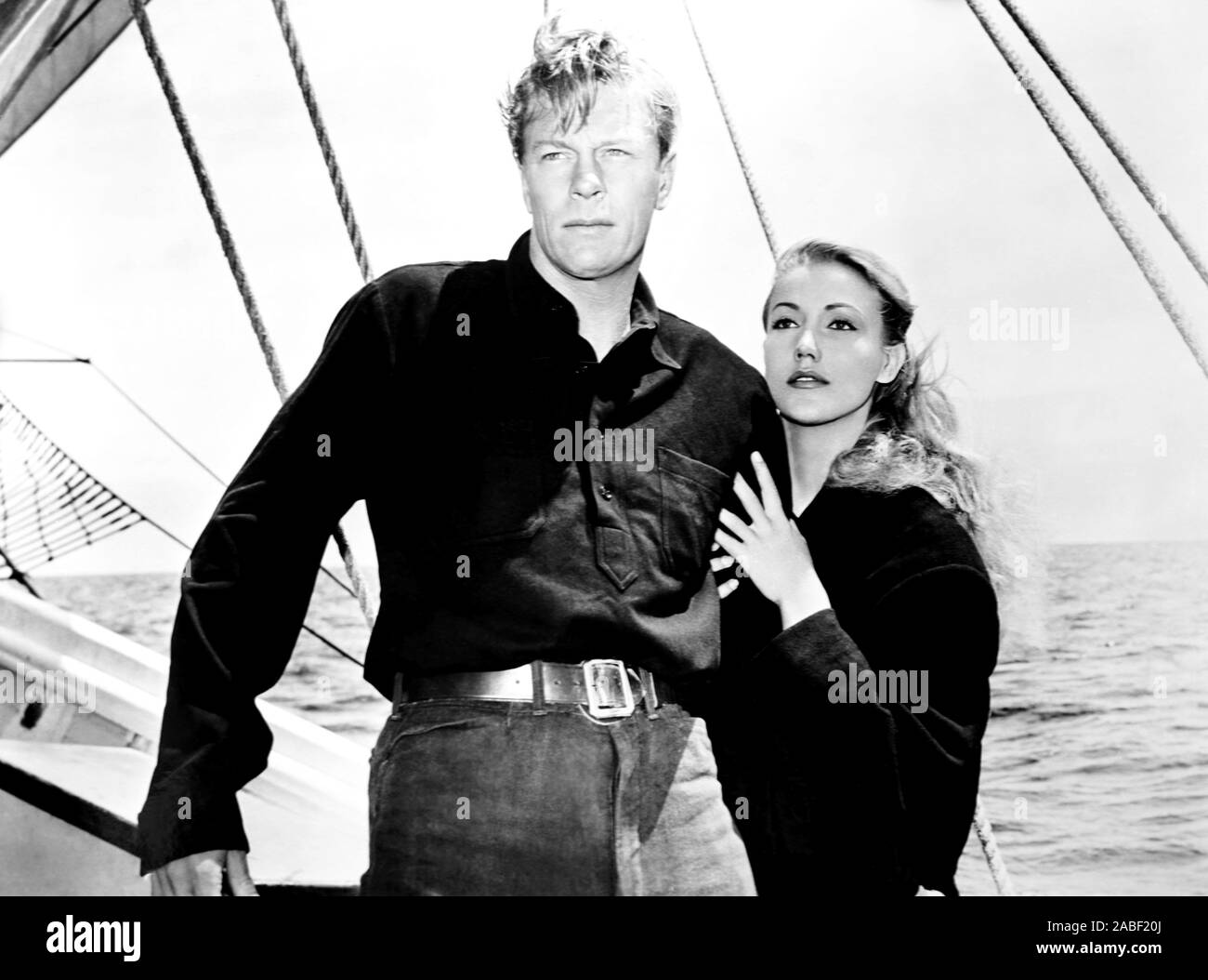WOLF LARSEN, from left, Peter Graves, Gita Hall, 1958 Stock Photo - Alamy
