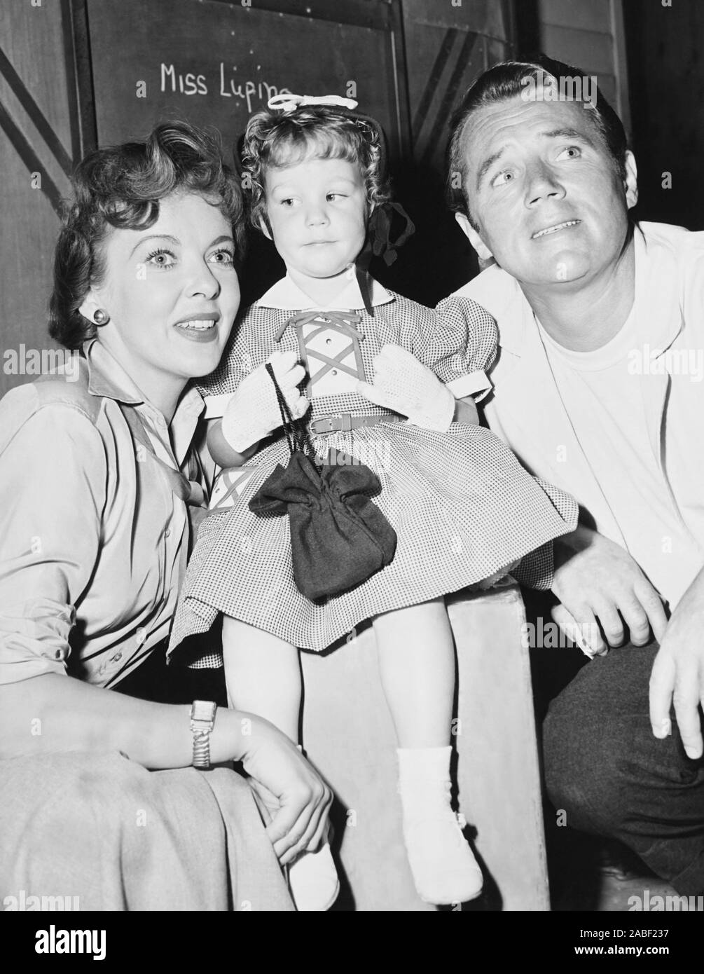 WOMEN'S PRISON, from left: Ida Lupino, Bridget Duff, Howard Duff on set ...