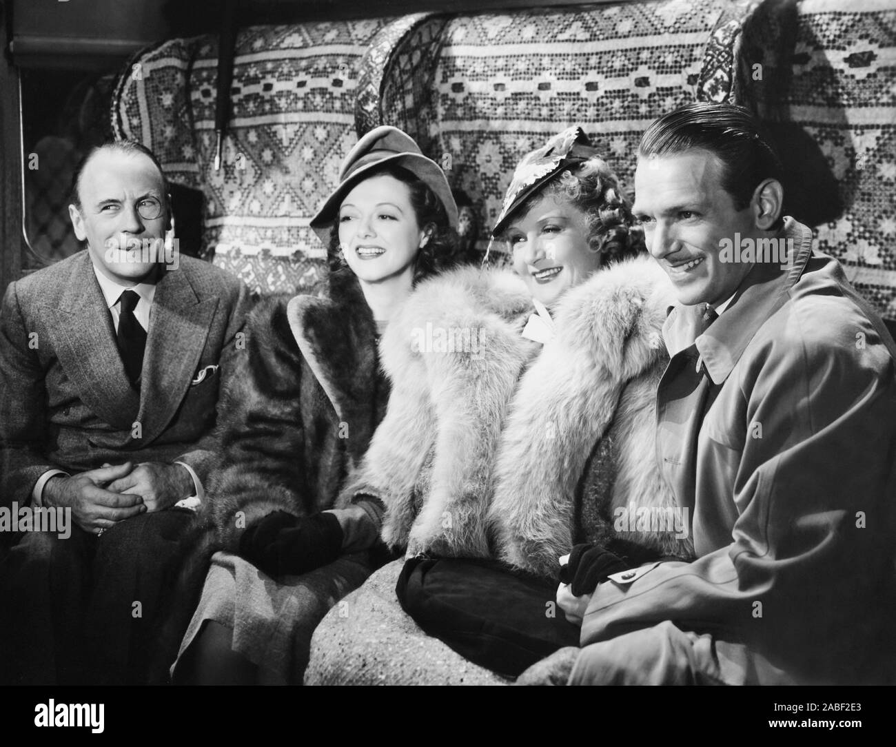 THE YOUNG IN HEART, from left: Roland Young, Janet Gaynor, Billie Burke ...