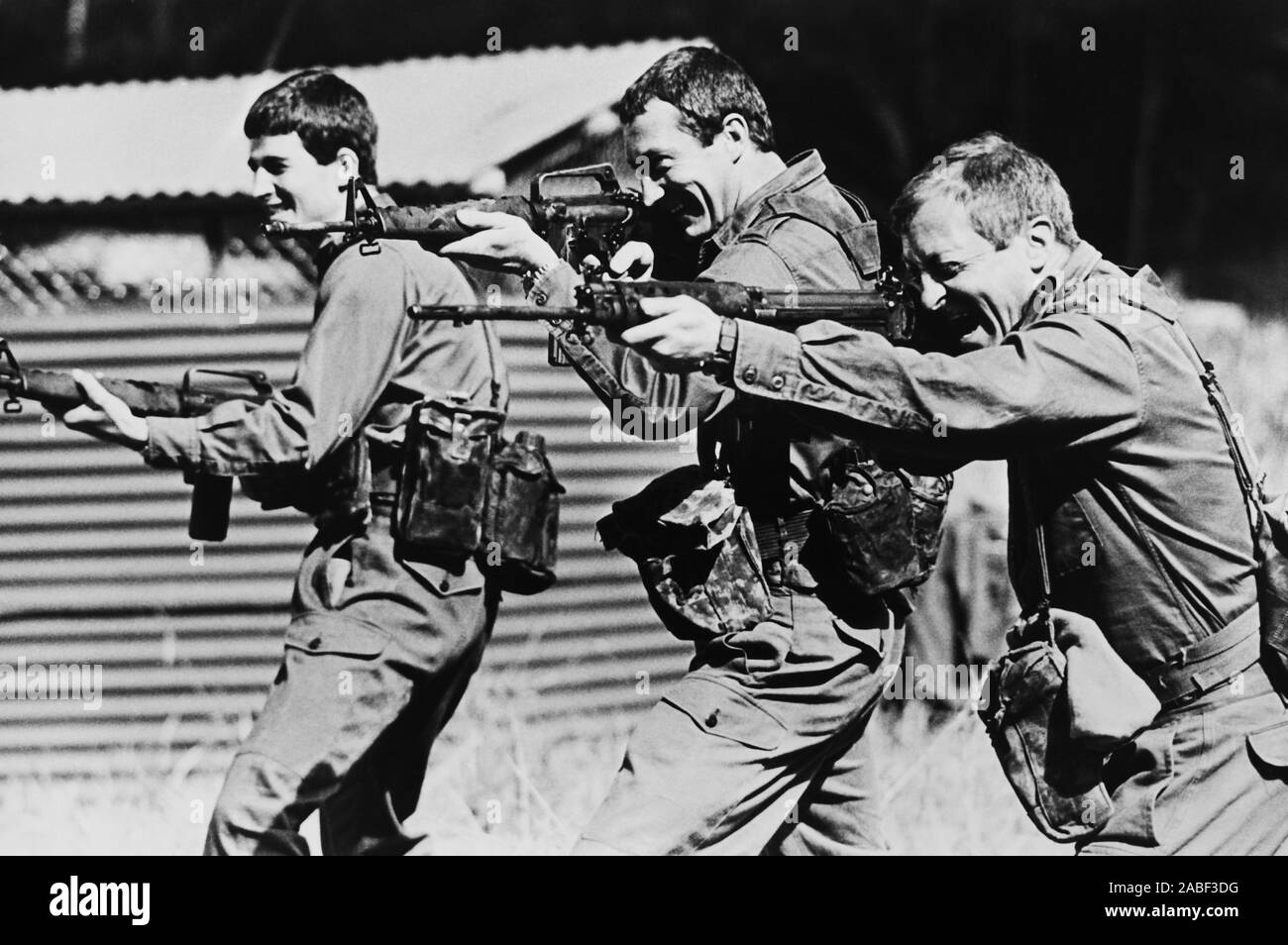 THE ODD ANGRY SHOT, from left: John Jarratt, Bryan Brown, Graham ...