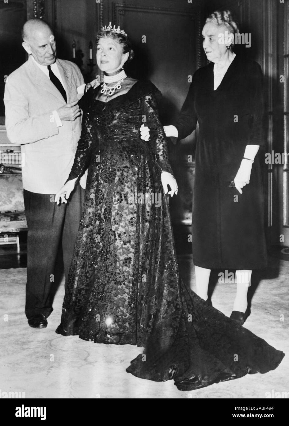 Helen Hayes (center) having her costume for ANASTASIA fitted by ...