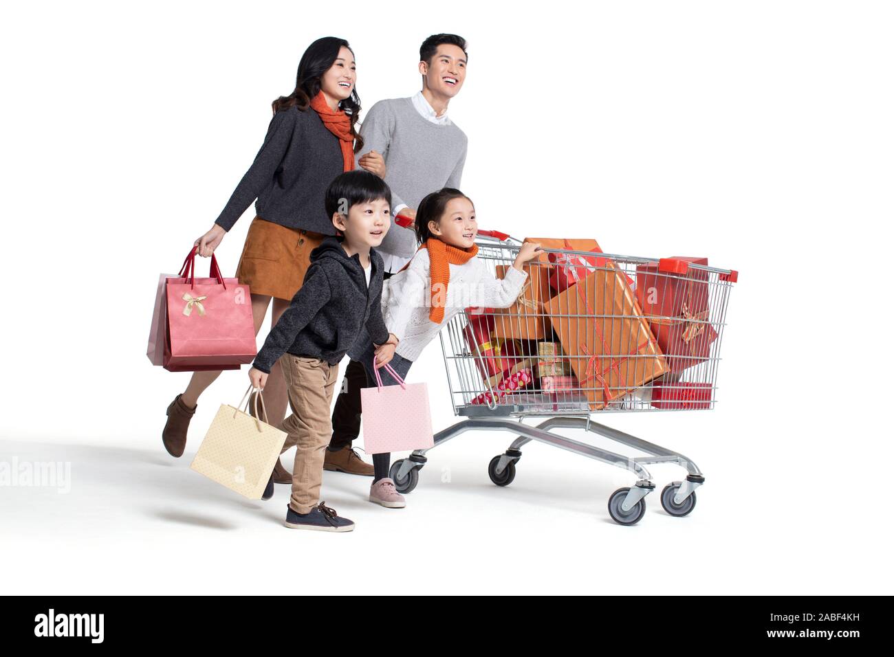 Asian family shopping Cut Out Stock Images & Pictures - Alamy