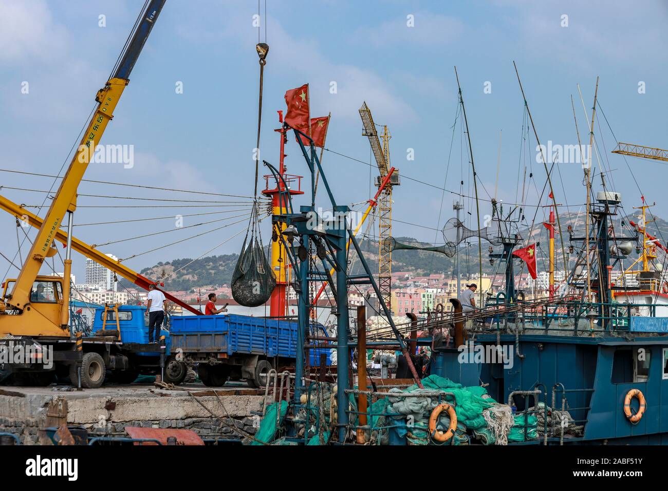 Fishing boats stop at Lanshan fishing port after catching enough ...