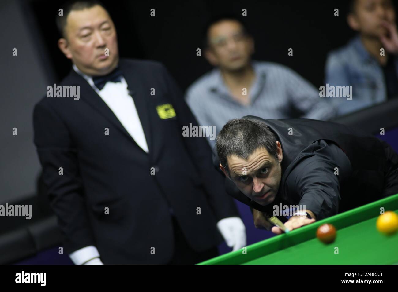 Ronald O'Sullivan of England plays a shot to Dominic Dale of Wales at ...