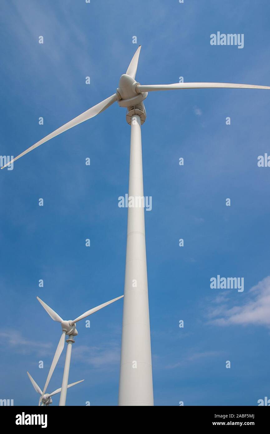 Row of wind turbines, generating clean, sustainable, alternative ...