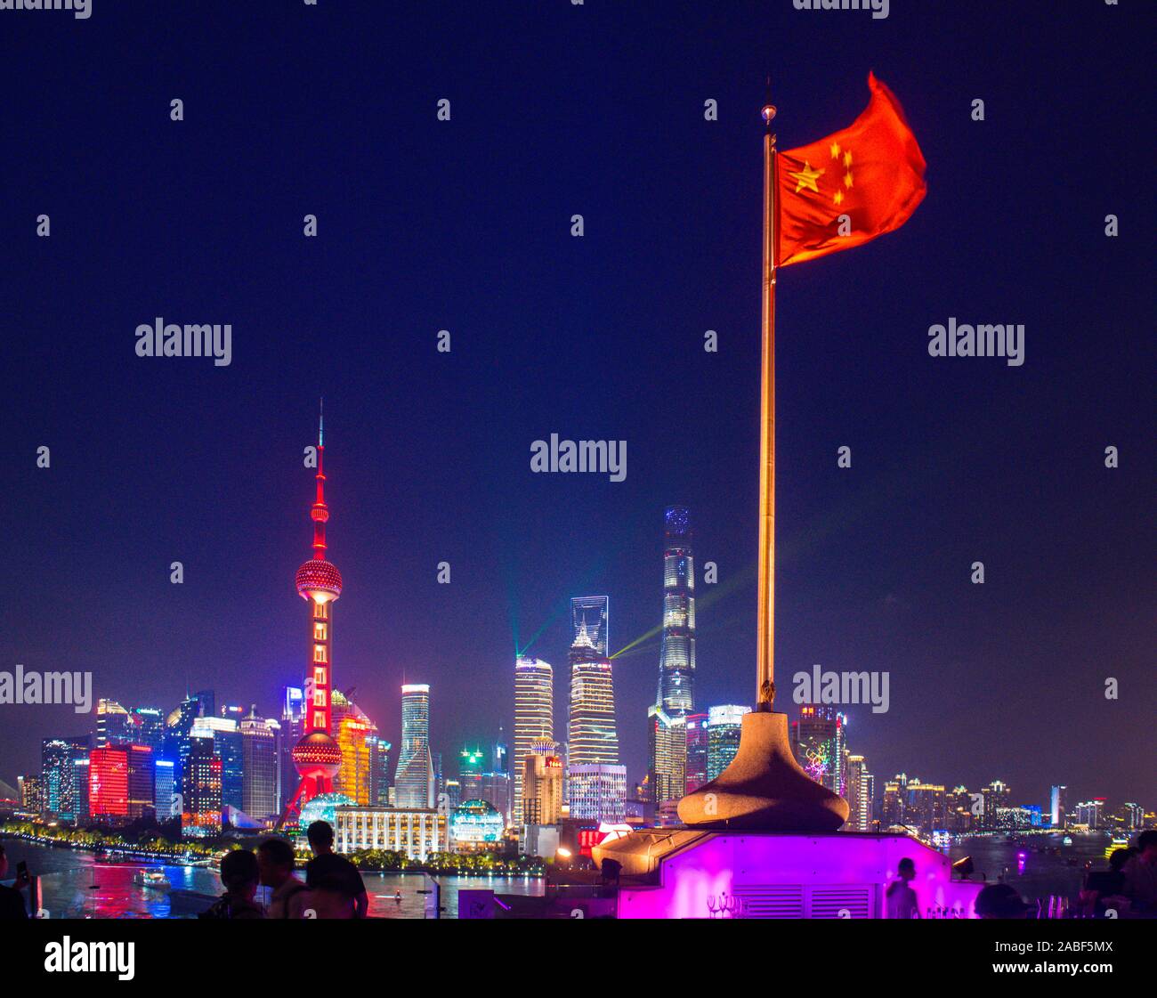 A grand light show is performed at the Bund with local landmarks as ...