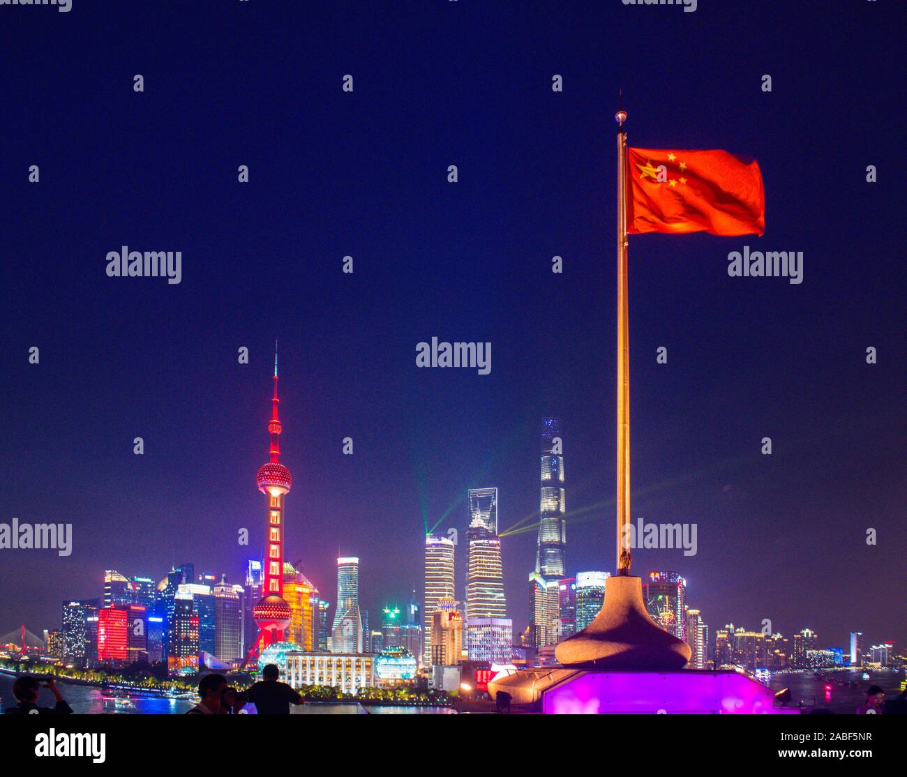 A grand light show is performed at the Bund with local landmarks as ...
