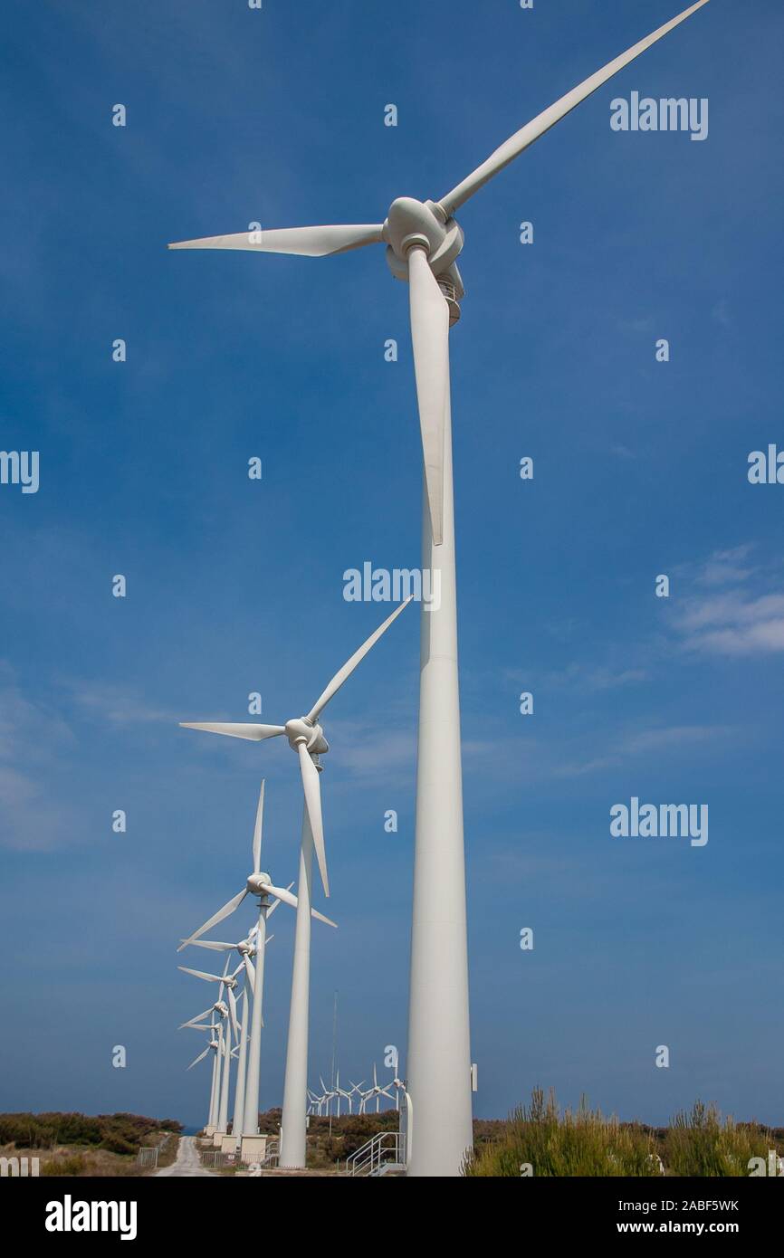 Row of wind turbines, generating clean, sustainable, alternative ...