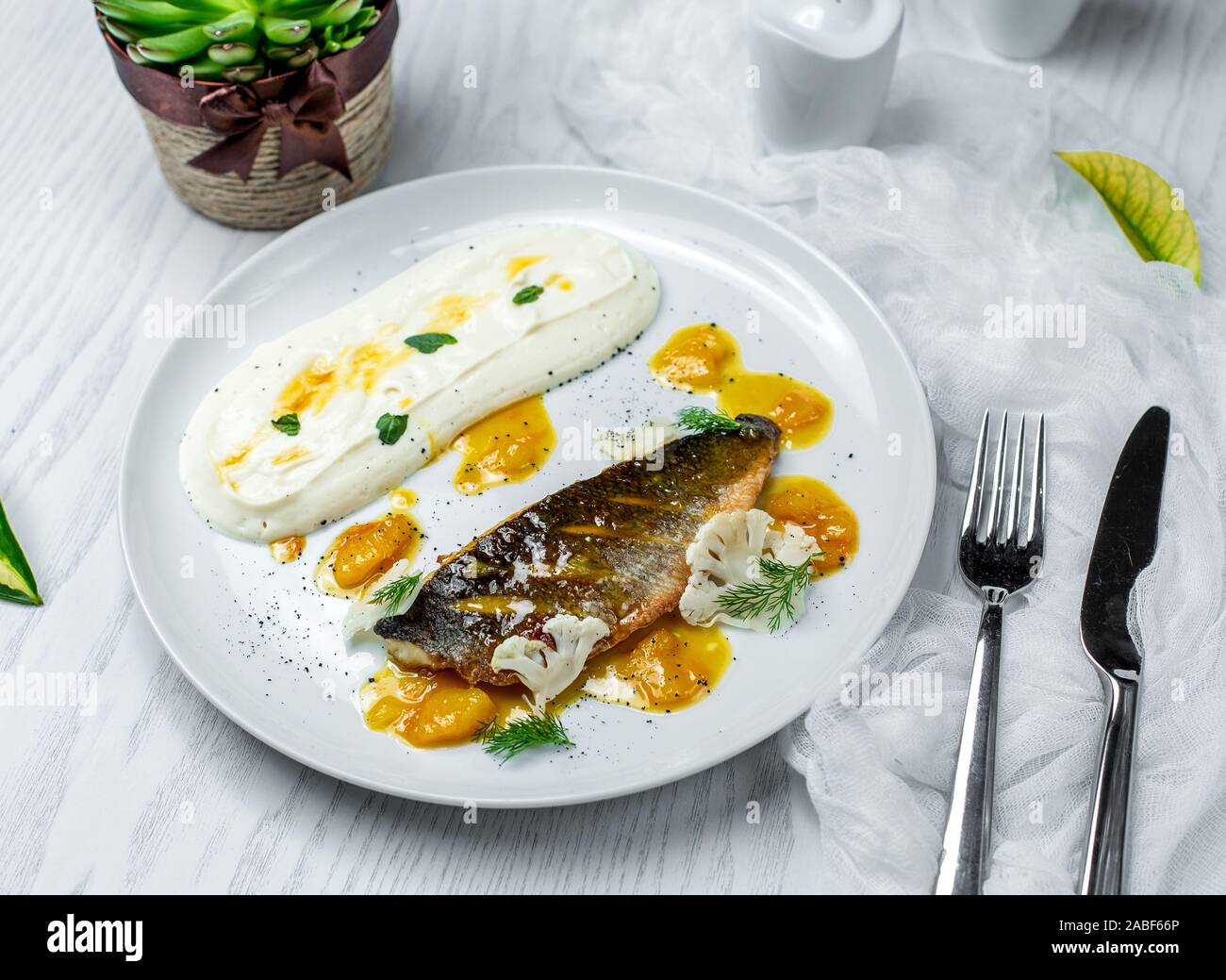 fried fish served with yoghurt Stock Photo - Alamy