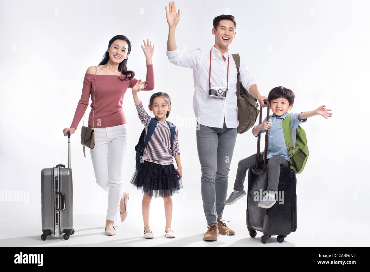 Two parents two children vacation close hi-res stock photography and ...